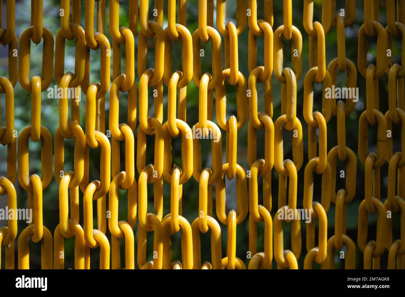 Set of yellow plastic chains Stock Photo - Alamy