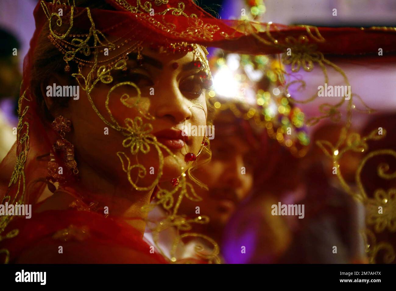 Karachi. 8th Jan, 2023. A bride poses for a photo during a mass wedding ...