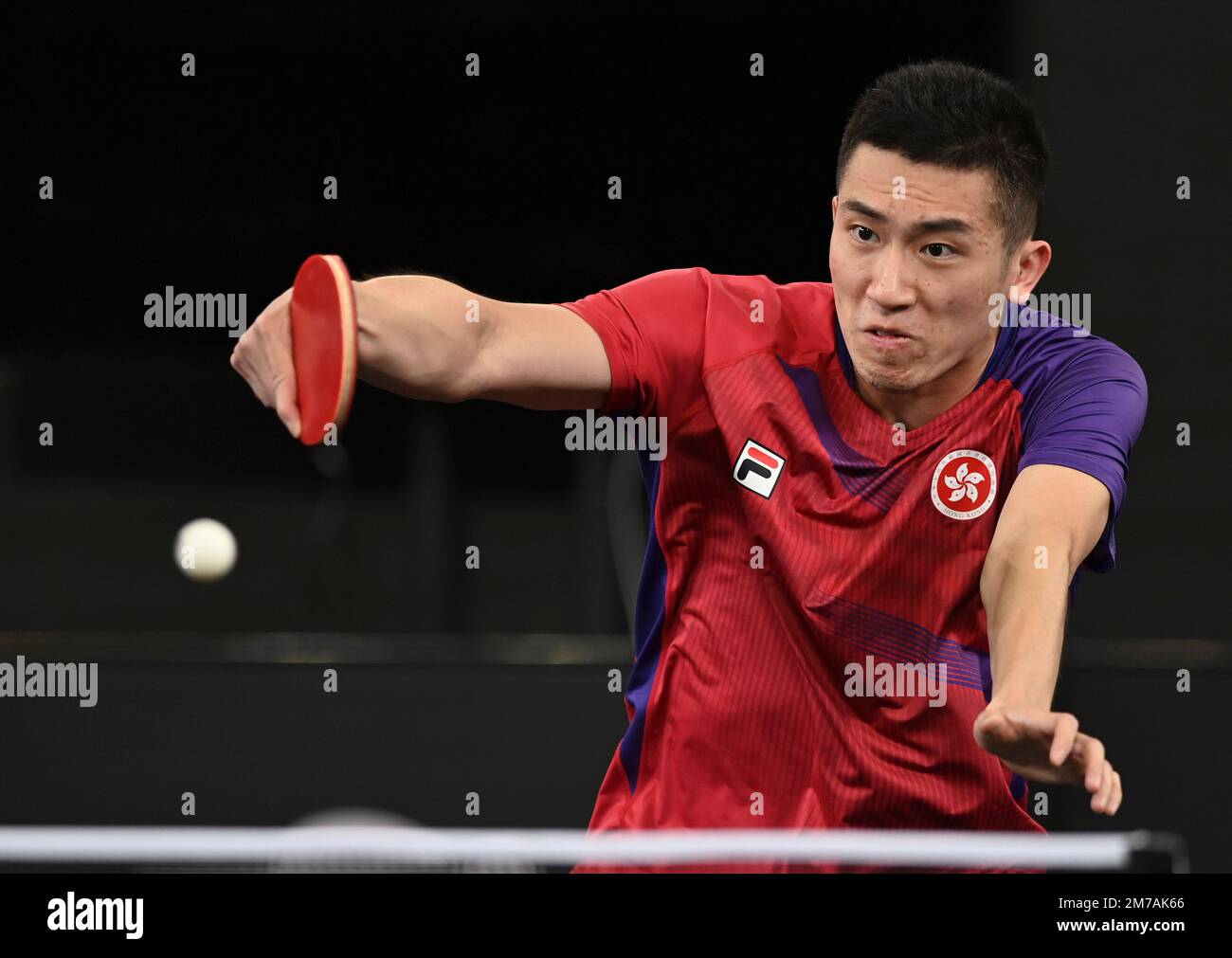 Doha, Qatar. 8th Jan, 2023. Lam Siu Hang of China's Hong Kong hits a ...