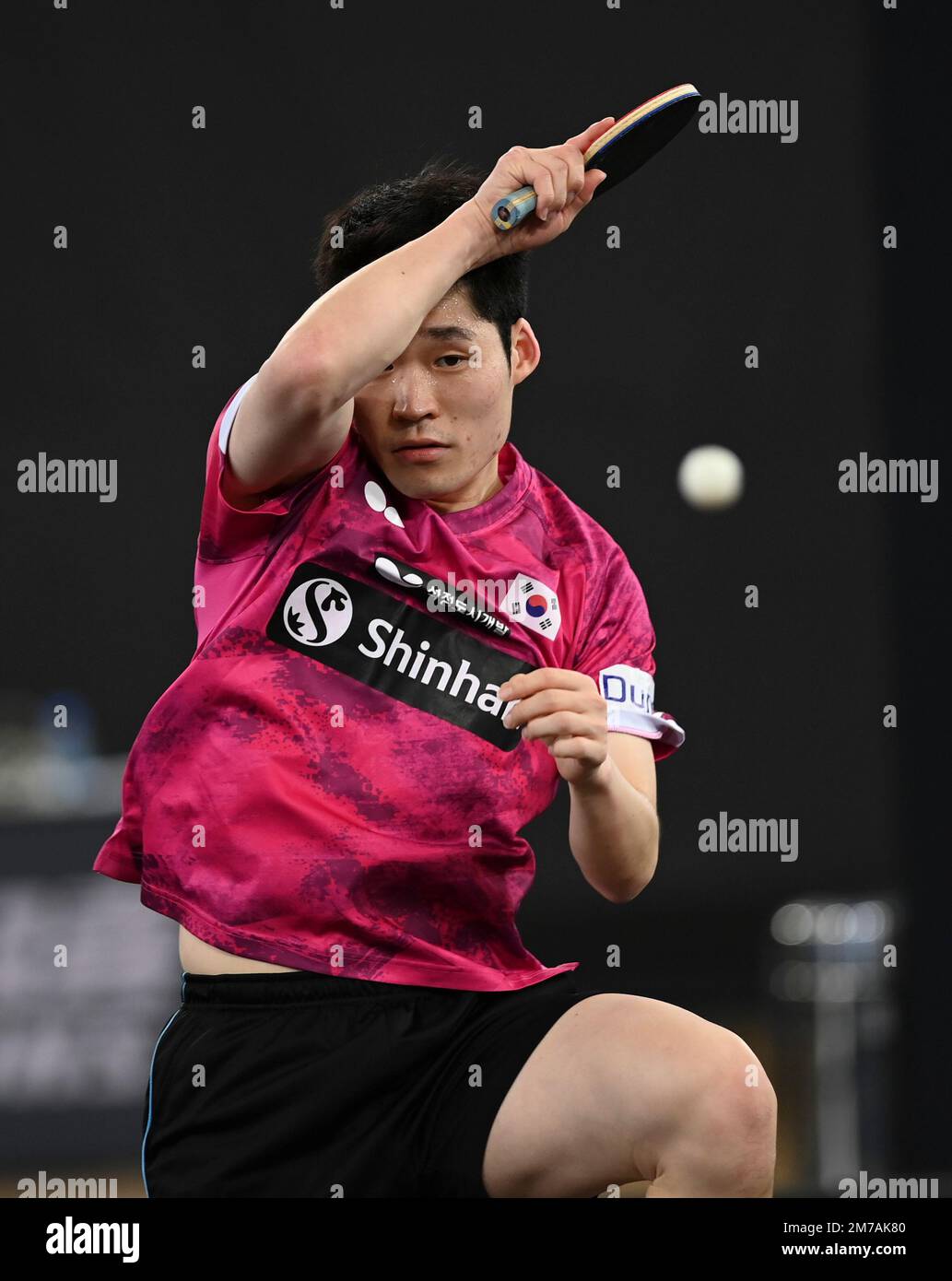 Doha, Qatar. 8th Jan, 2023. Jang Woojin of South Korea hits a return against Jayasanka de Silva ...