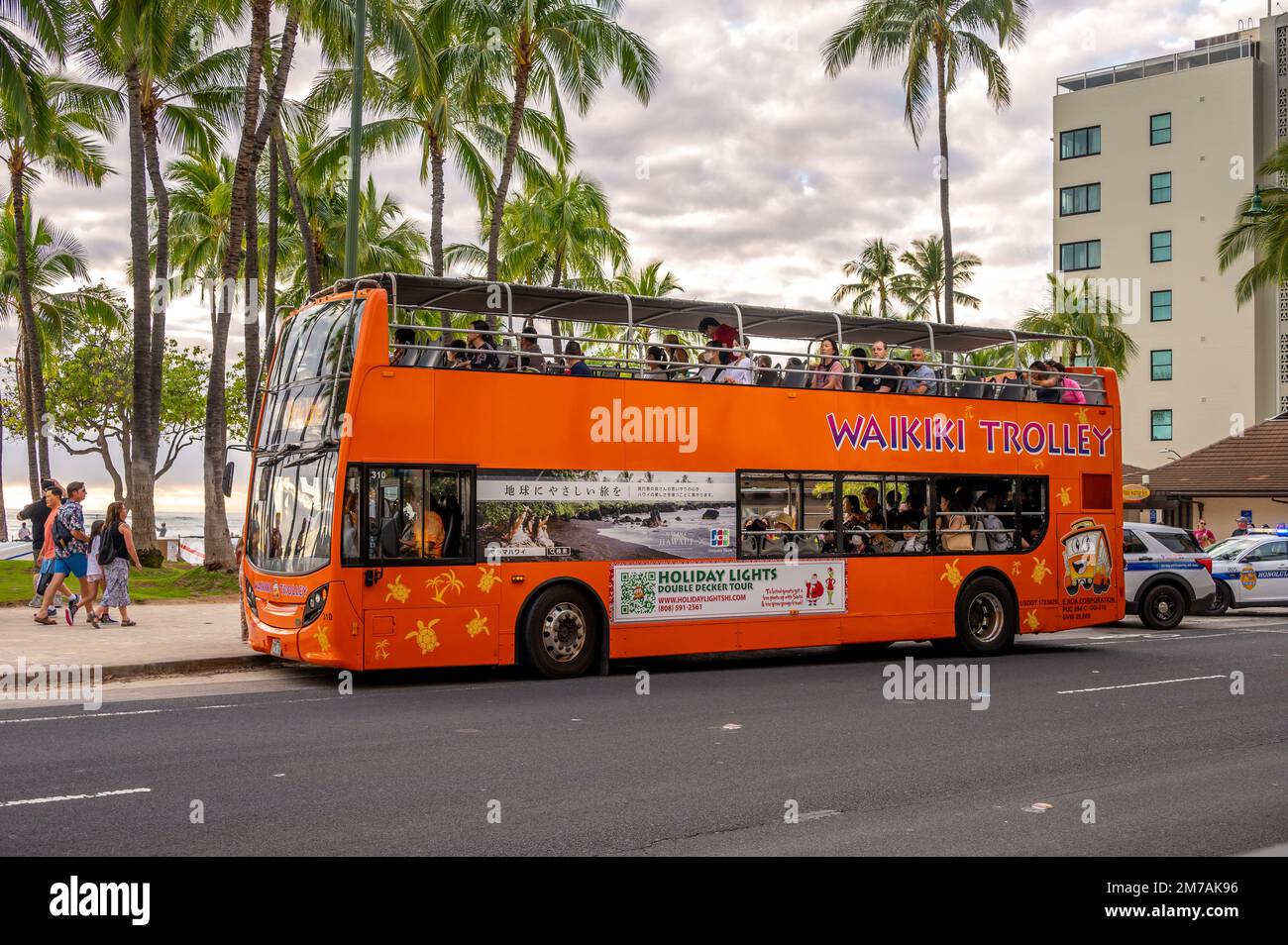 Honolulu, Hawaii - December 29, 2022: The Waikiki Trolley picking up ...