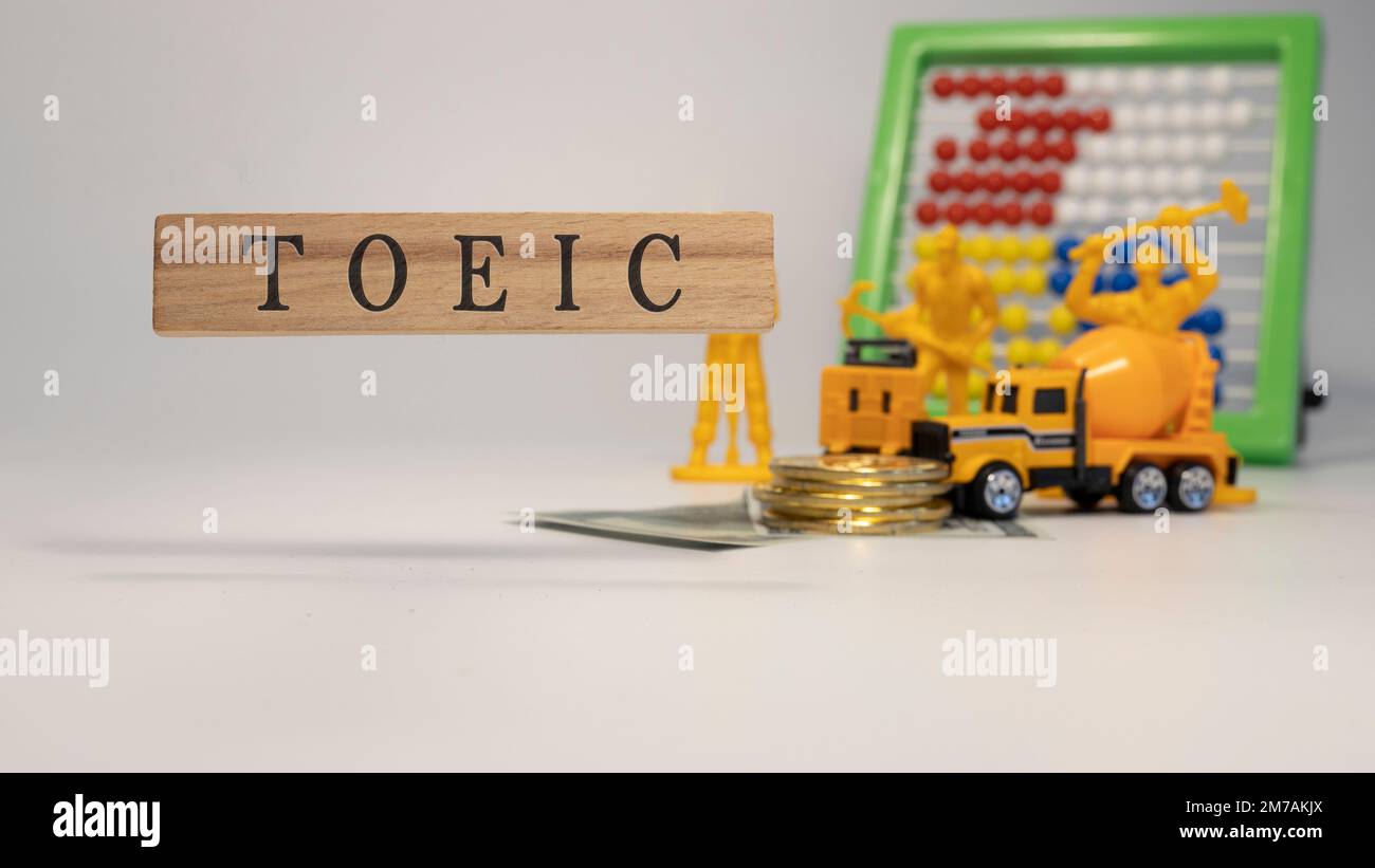 TOEIC text. It was taken in the studio written on a wooden frame. white ...