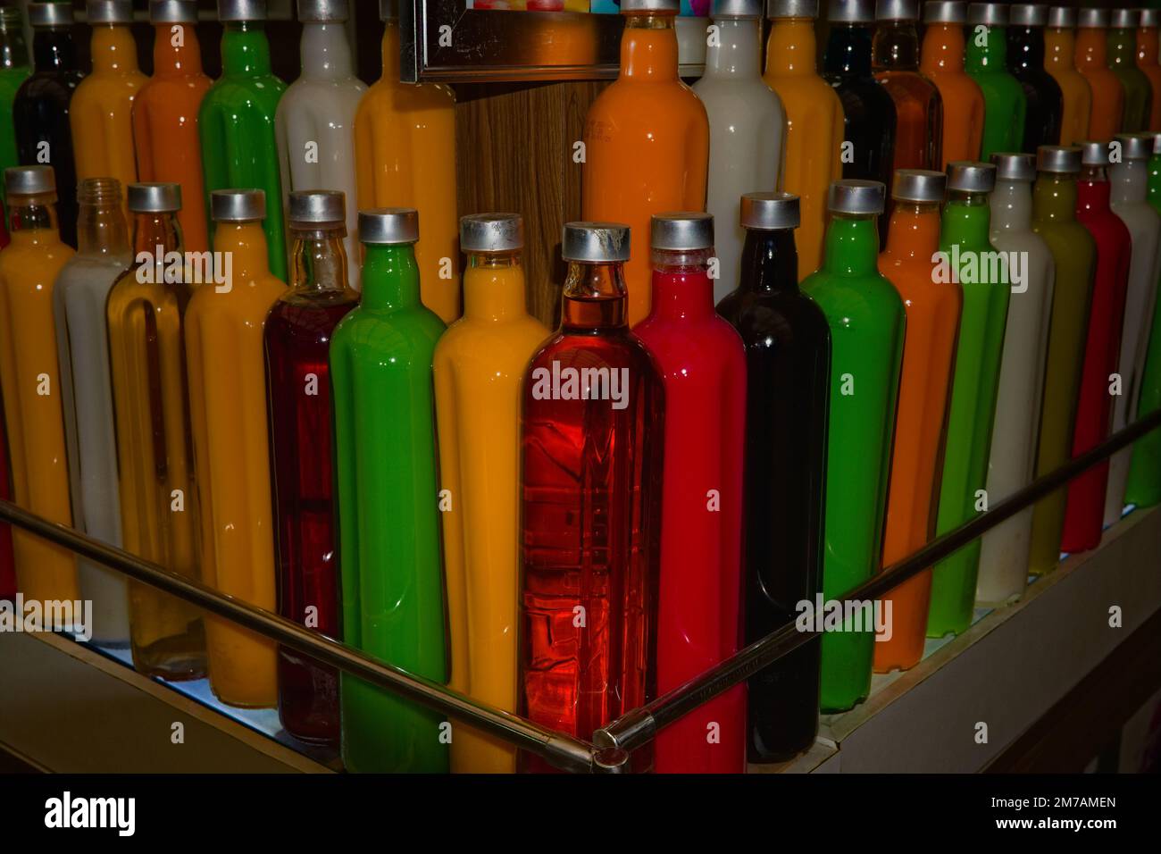 colorful bottles arranged together Stock Photo - Alamy