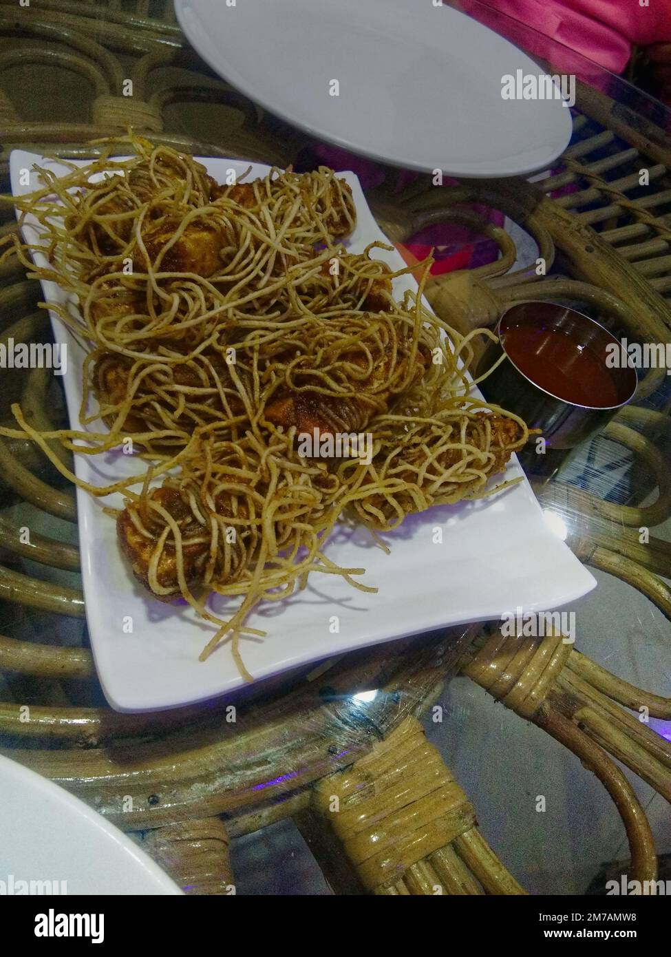 veg snacks fried paneer wrapped in noodles Stock Photo - Alamy