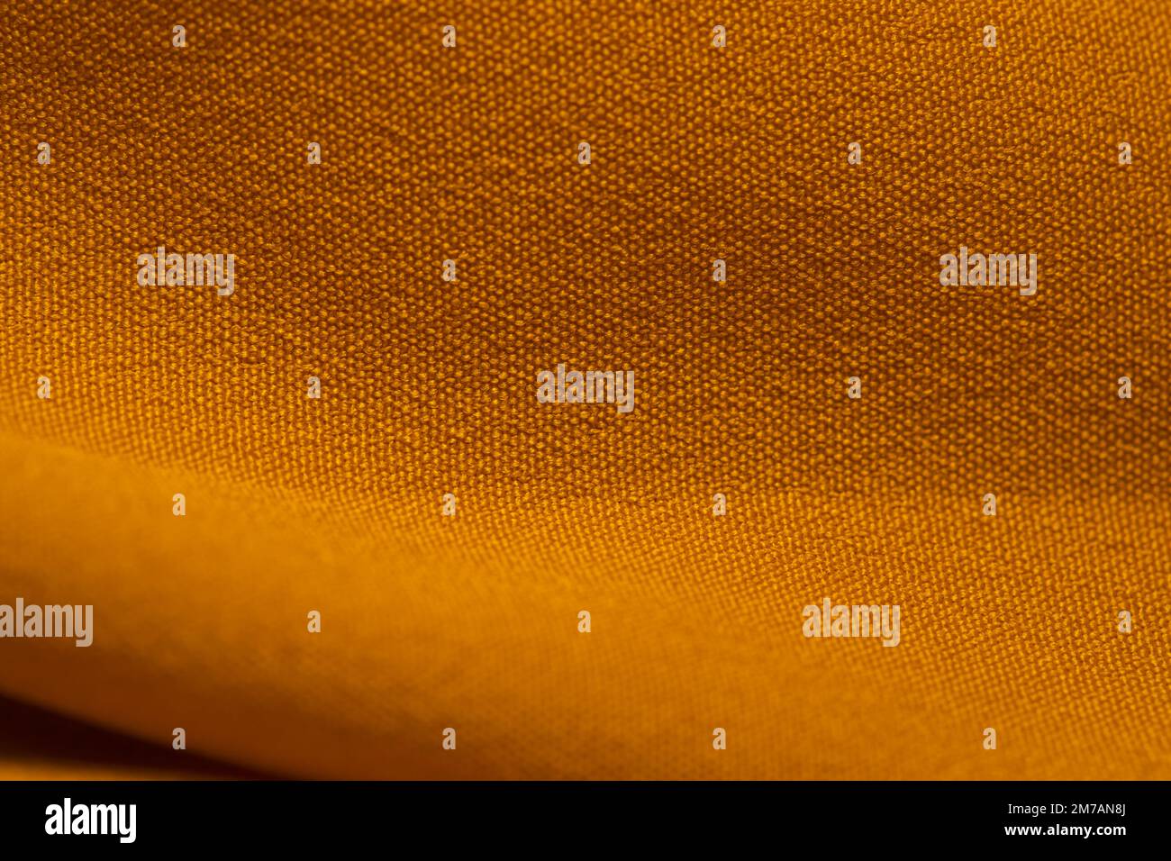 Yellow fabric background. Yellow cloth waves background texture. Yellow ...