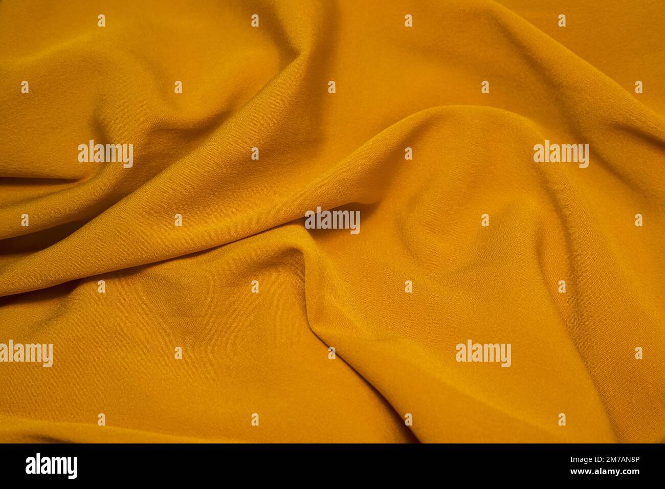 Yellow fabric background. Yellow cloth waves background texture. Yellow ...