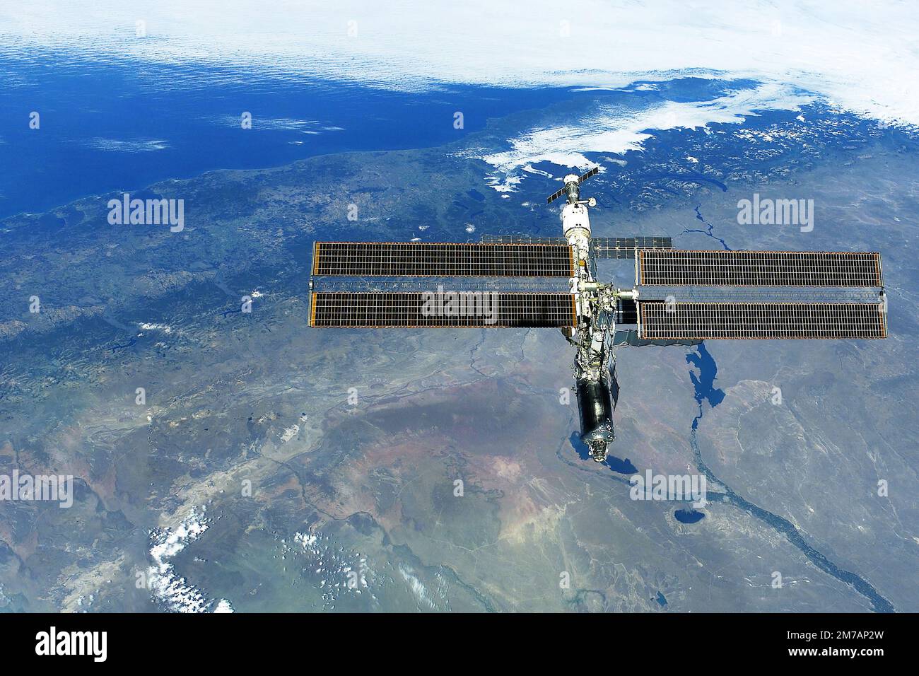 Space communications satellite above the earth. Elements of this image ...