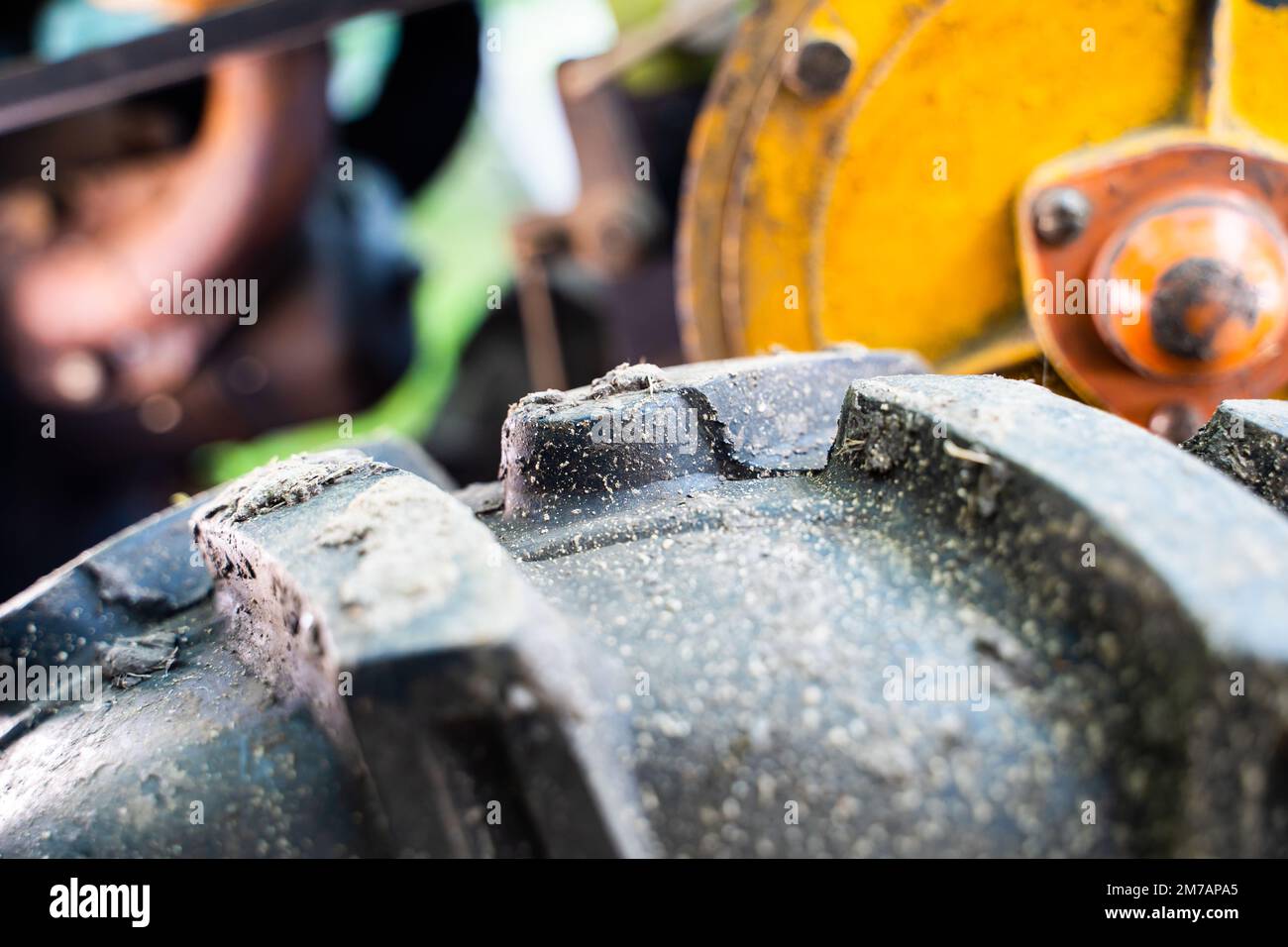 Volumetric rubber tread on a tractor wheel close-up. Mud tread pattern ...