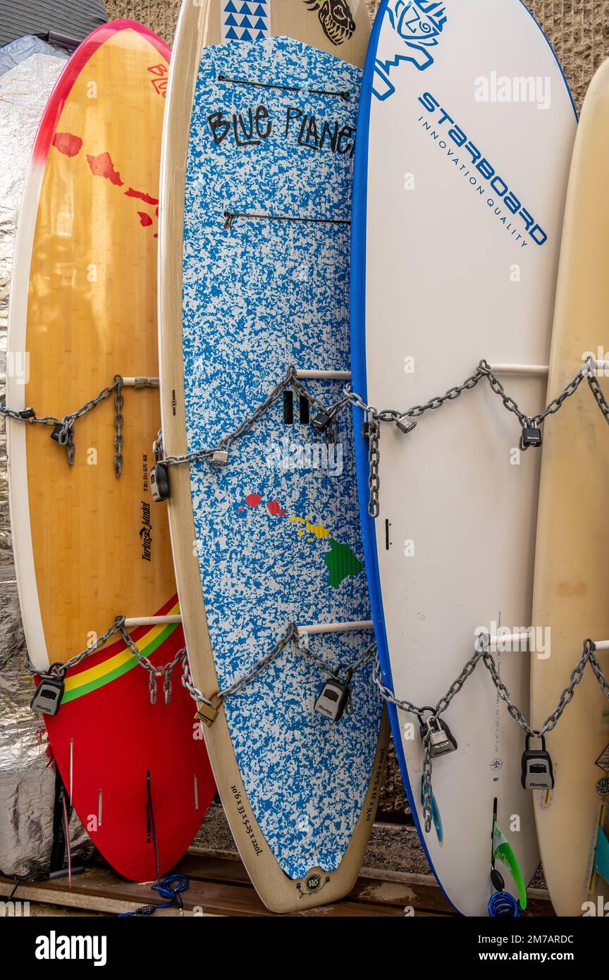 Honolulu, Hawaii - December 31, 2023: Surfboards lined up in storage in ...