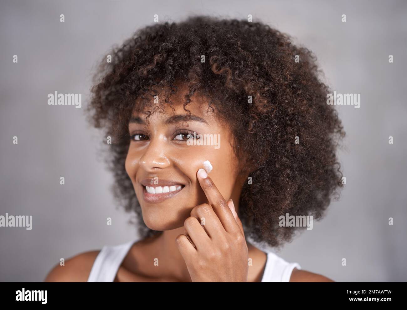 Happy young black woman applying hi-res stock photography and images ...