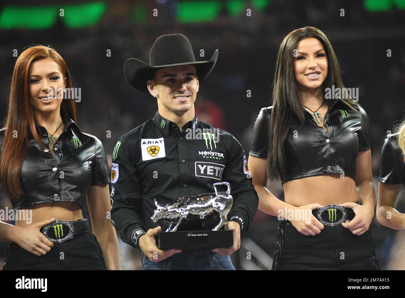 Professional Bull Rider Jose Vitor Leme is presented a trophy after ...