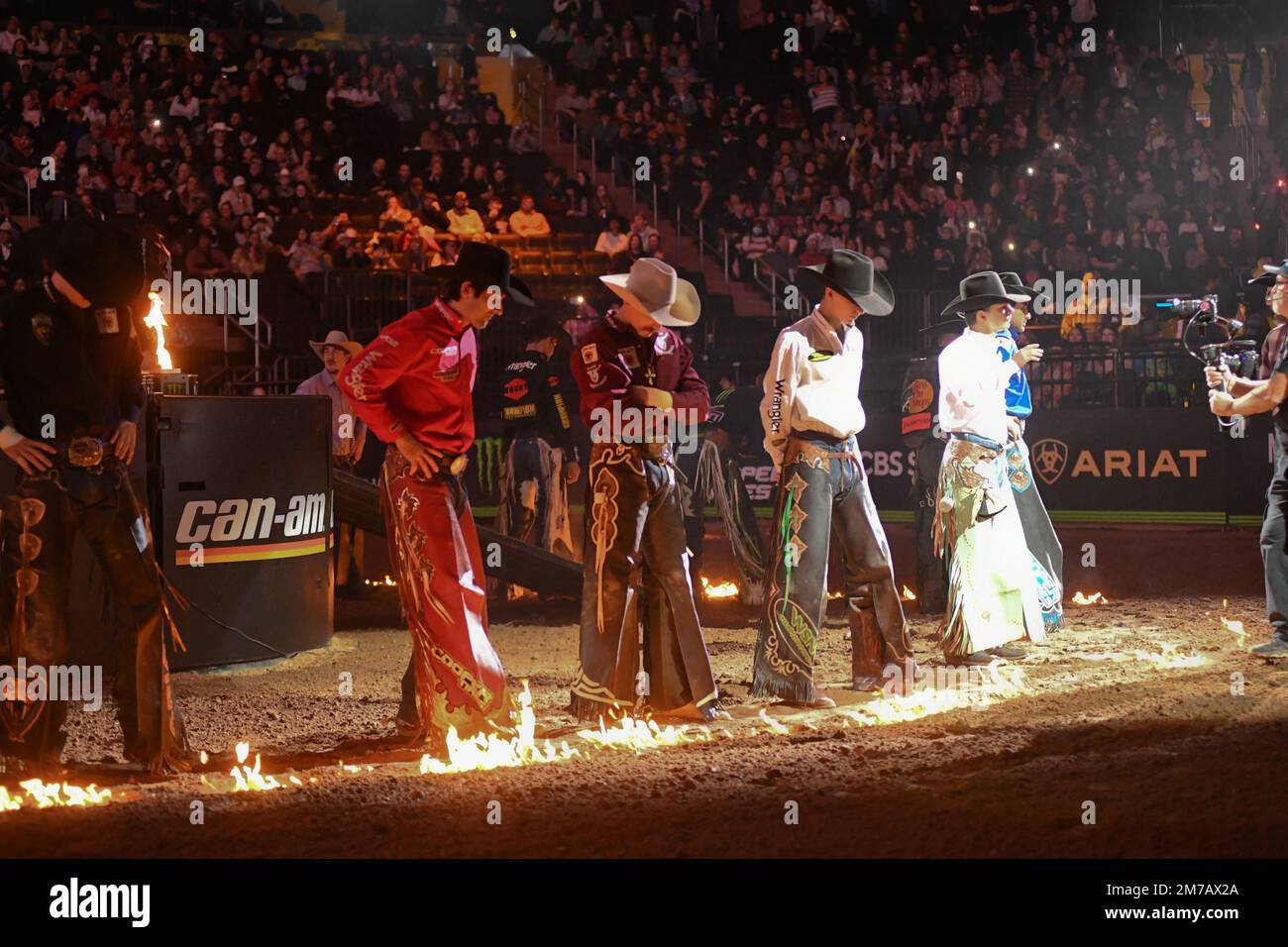 Professional Bull Riders are introduced during an opening ceremony at ...