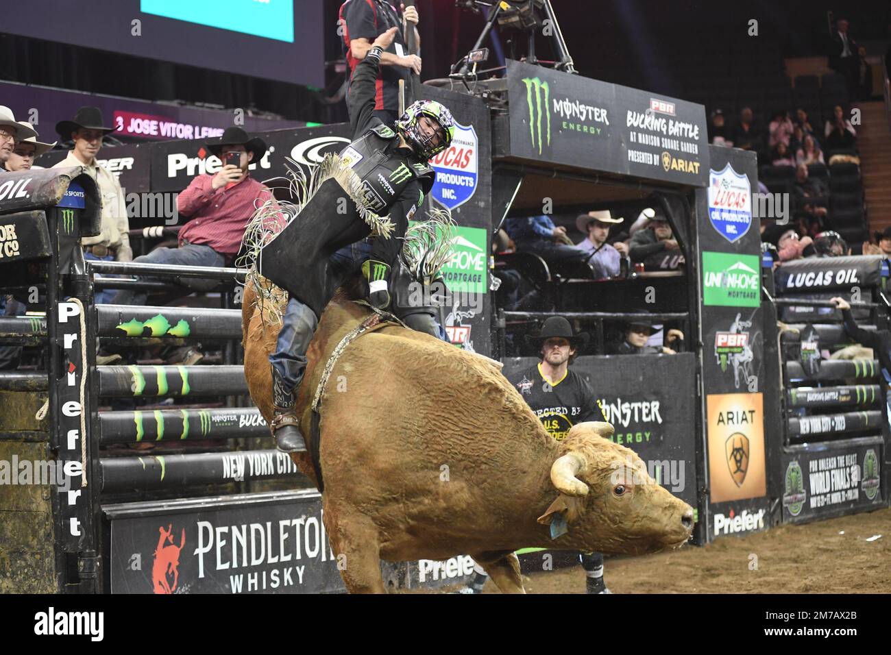 Professional Bull Rider Jose Vitor Leme rides bull Cliff Hanger during ...