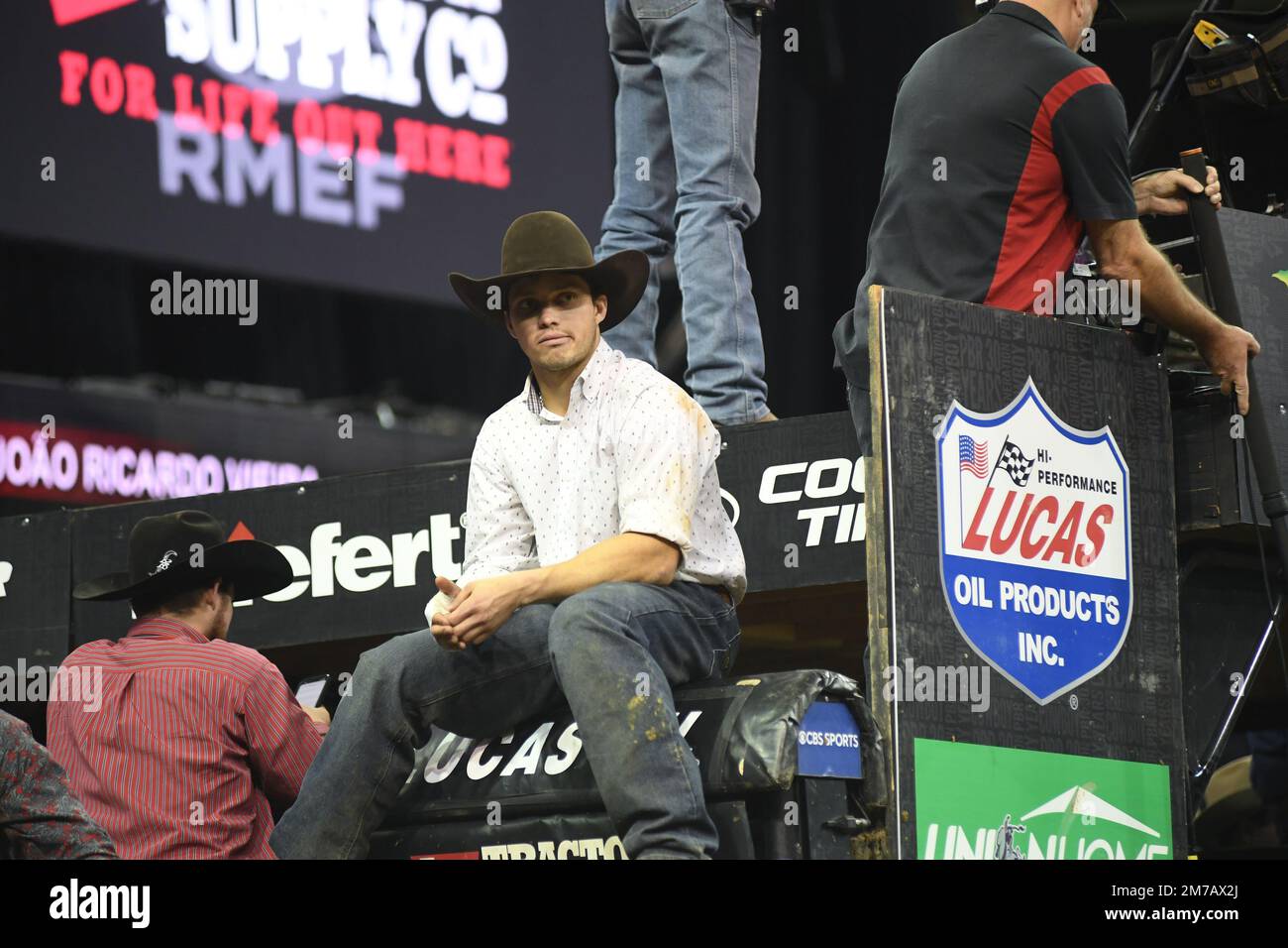 A cowboy is seen at the PBR Monster Energy ‘Buck Off’ competition at ...