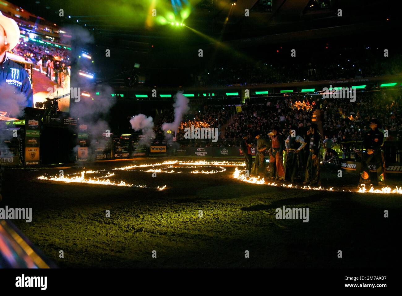 Professional Bull Riders are introduced during an opening ceremony at ...