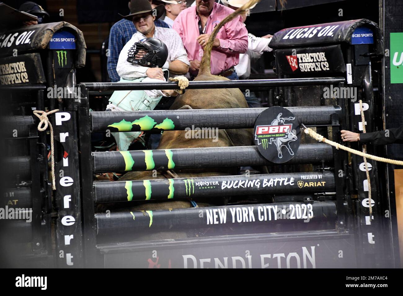 Professional Bull Rider Thiago Salgado rides bull Razzmatazz during PBR Monster Energy ‘Buck Off ...