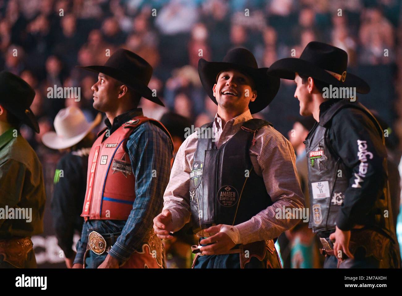 Professional Bull Riders are introduced during an opening ceremony at ...