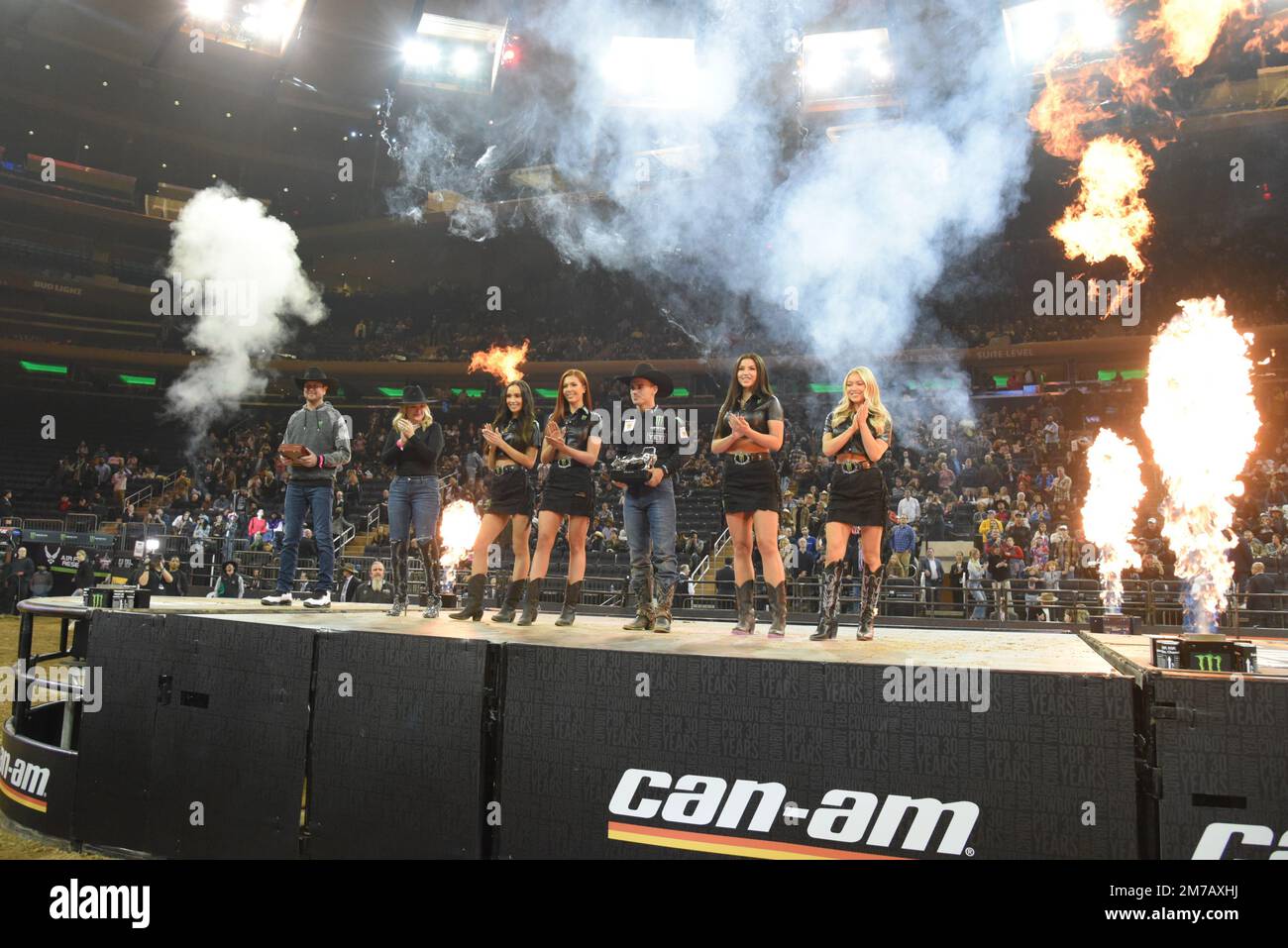 Professional Bull Rider Jose Vitor Leme is presented a trophy after ...