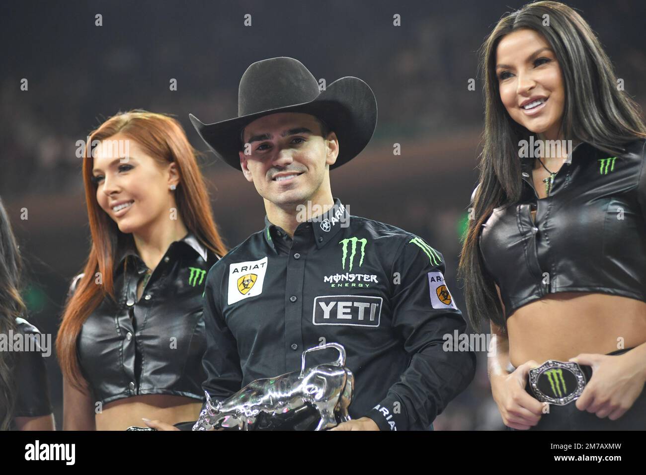 Professional Bull Rider Jose Vitor Leme is presented a trophy after ...