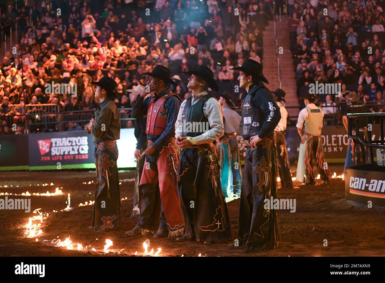 Professional Bull Riders are introduced during an opening ceremony at ...