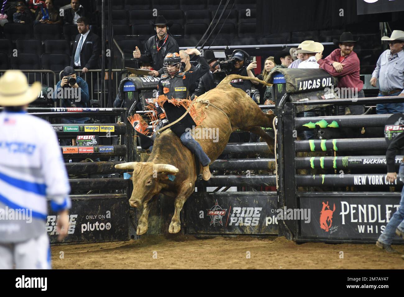 Professional Bull Rider Casey Roberts rides bull Dan Post's Night Moves during PBR Monster ...