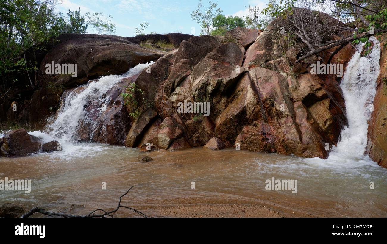 Two Waterfalls Flowing From The Mountains Stock Photo - Alamy