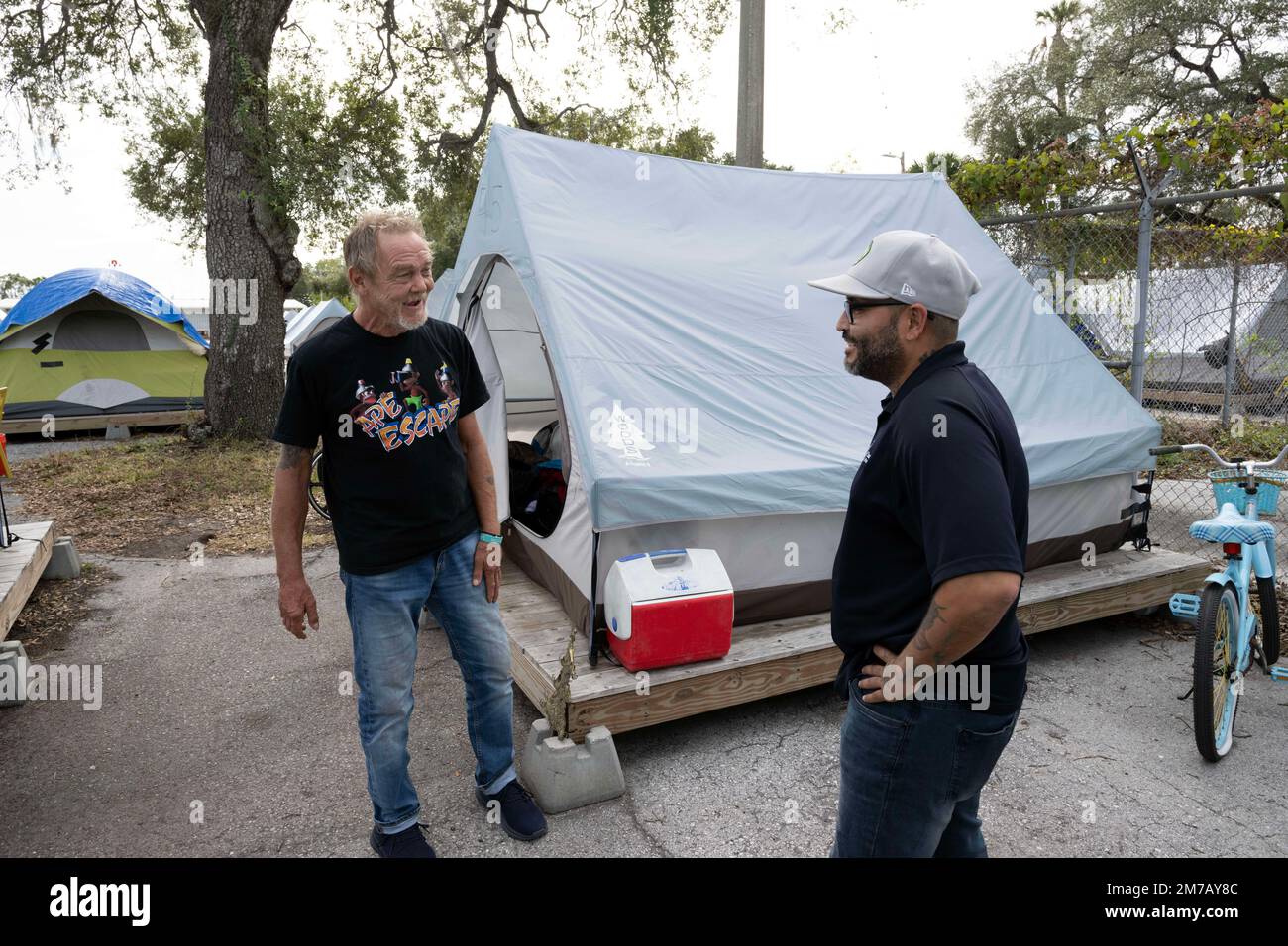 Tampa, Florida, USA. 30th Dec, 2022. Doug Craven, 65, chats with ...