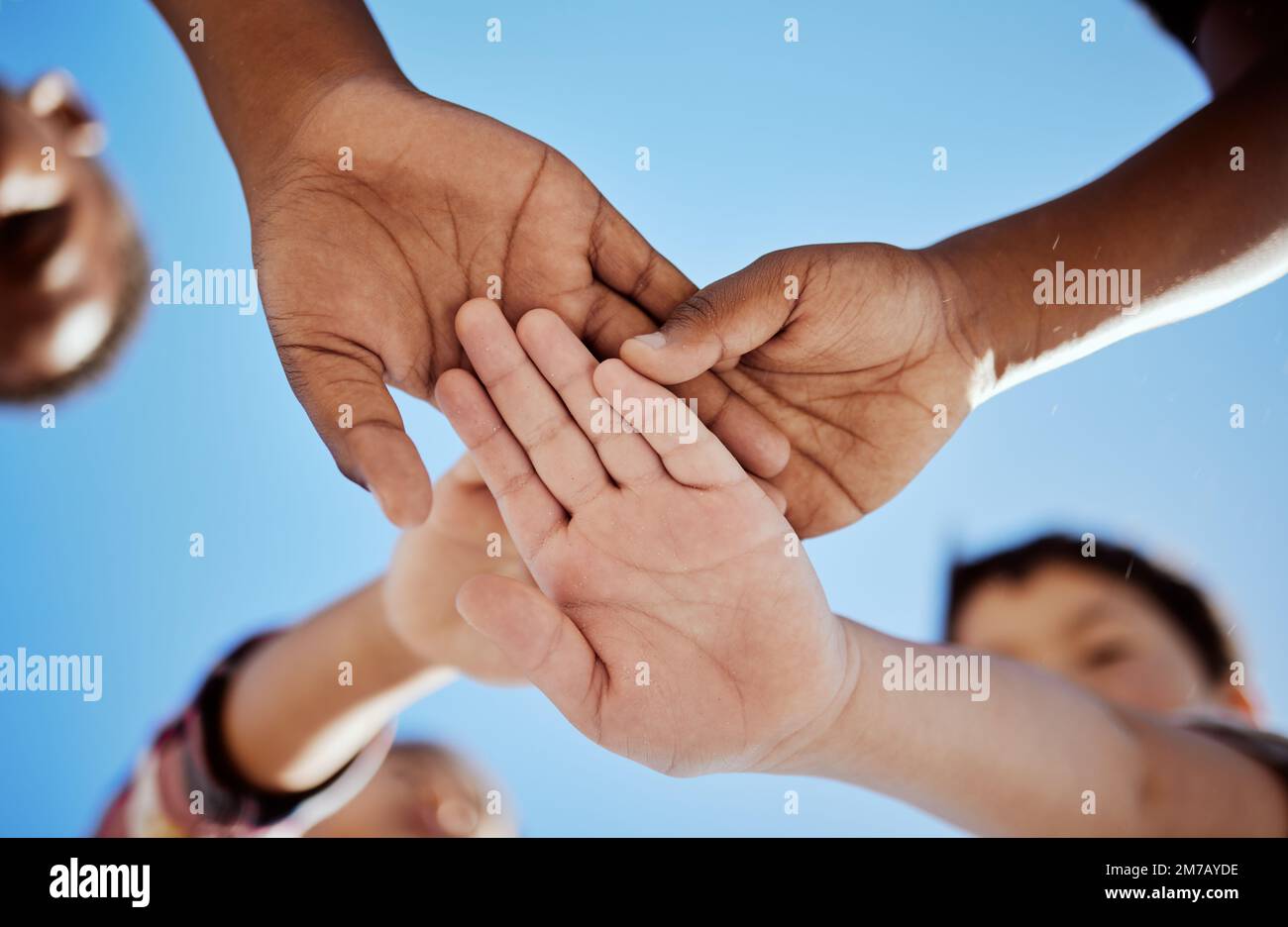 Diversity, stack of hands and children in unity, support or solidarity ...