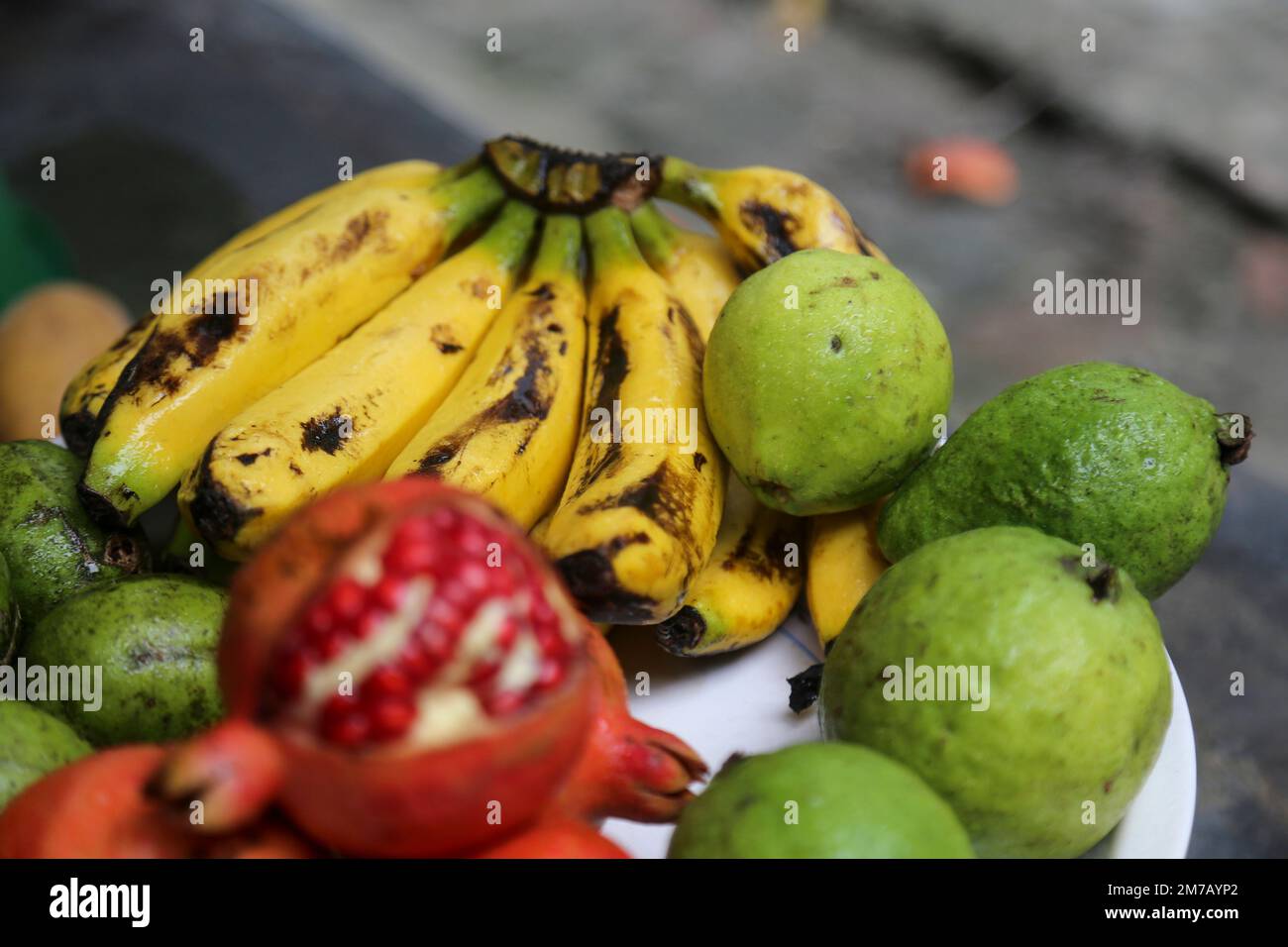 A collection of Bangladeshi fruits including Hog Pulms, guava ...