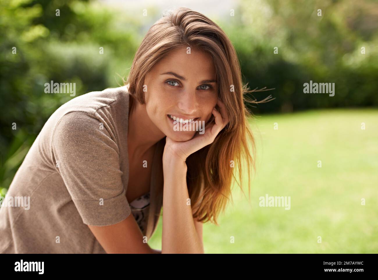 Summer sun is the best source of vitamin D. a woman enjoying the ...