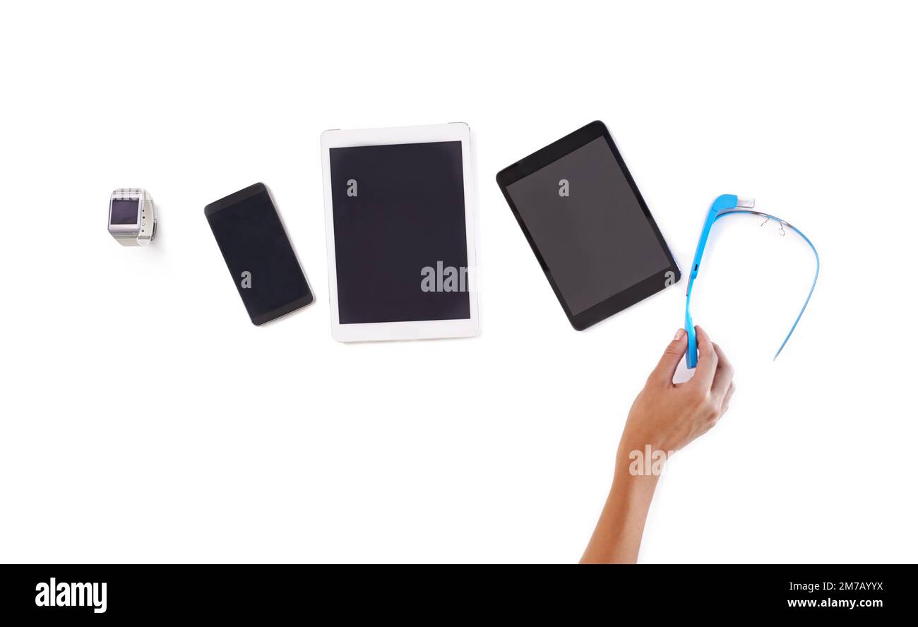 Tools of the trade. a hand holding a mobile phone as part of a ...