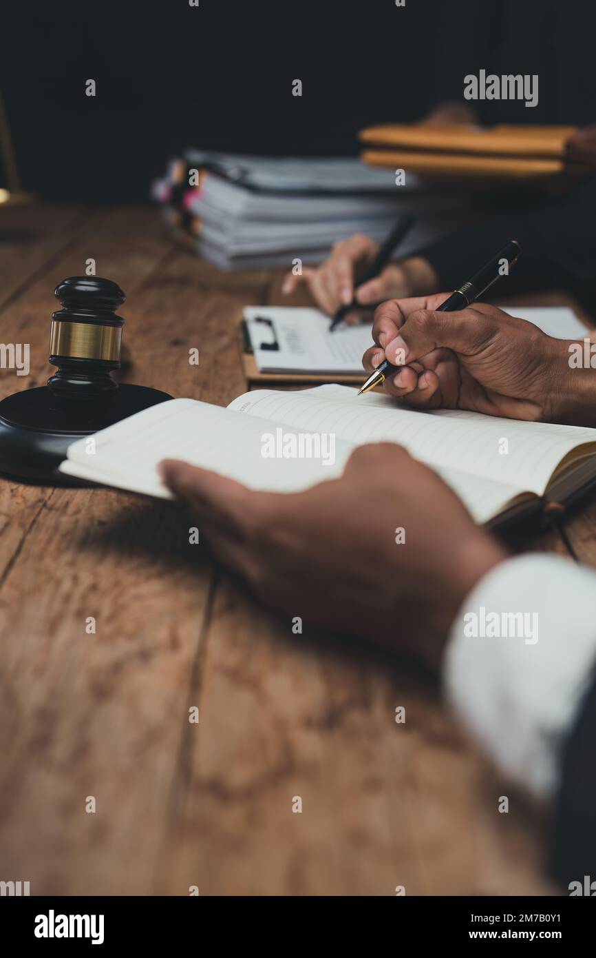 Lawyer business people working with agreement contract in office ...