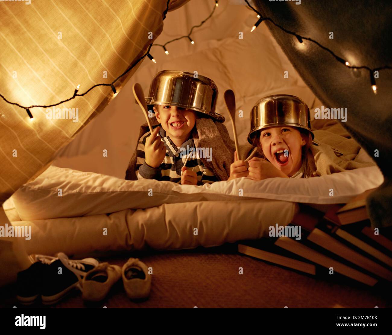 Youll never take us. cute little children with pot helmets in a blanket ...