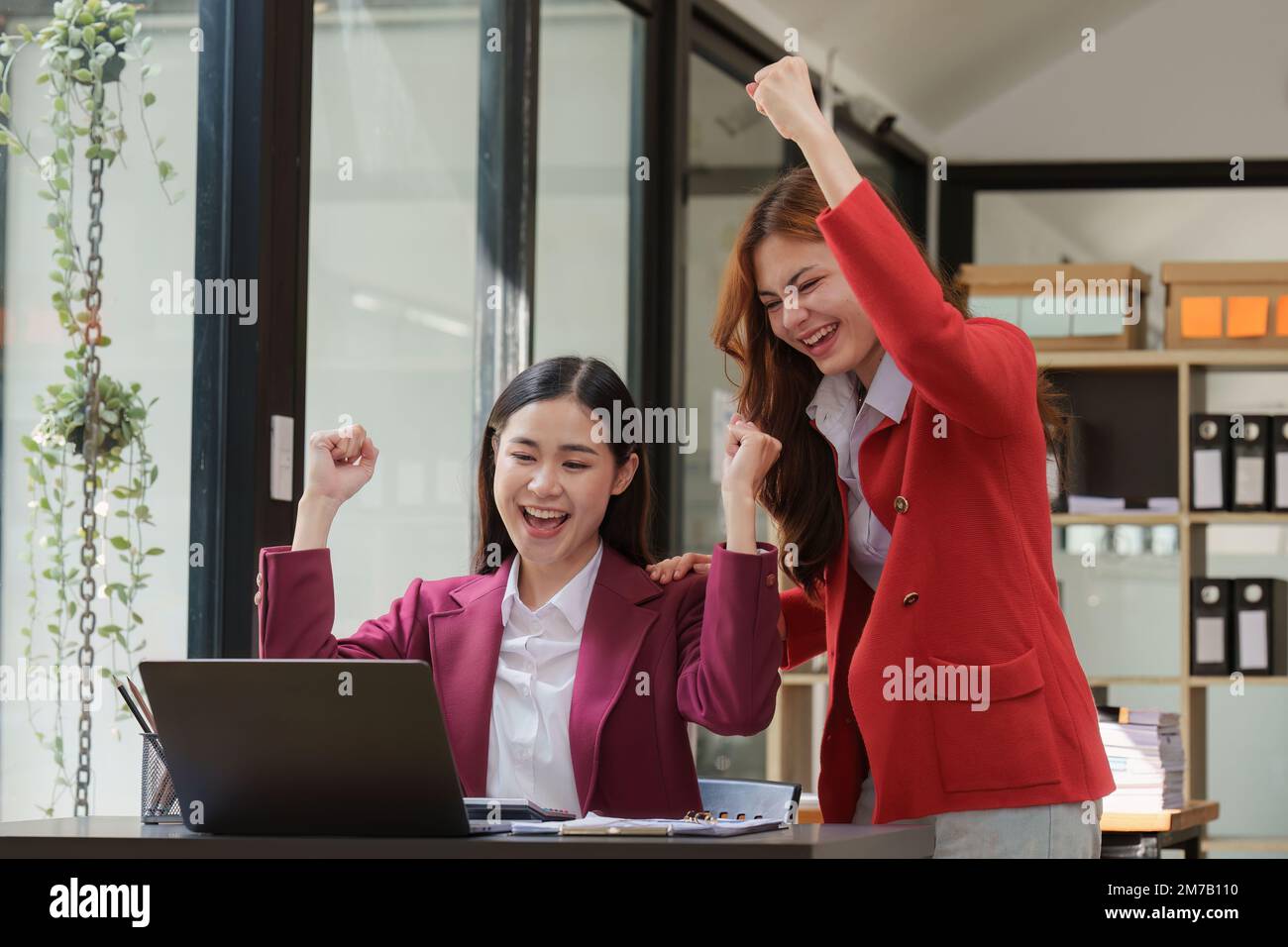 Good teamwork result concept. Excited successful business people ...