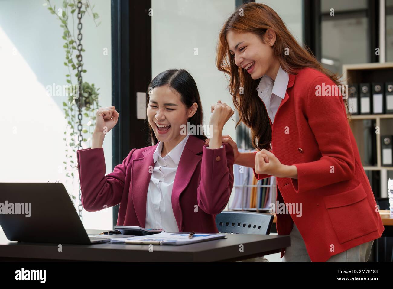 Good teamwork result concept. Excited successful business people ...