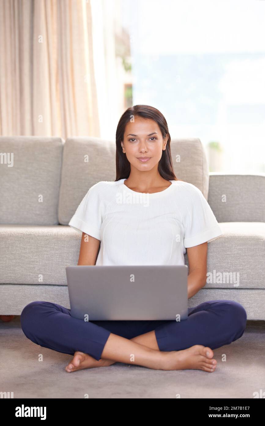 Time for some relaxed weekend browsing. Portrait of a beautiful young ...