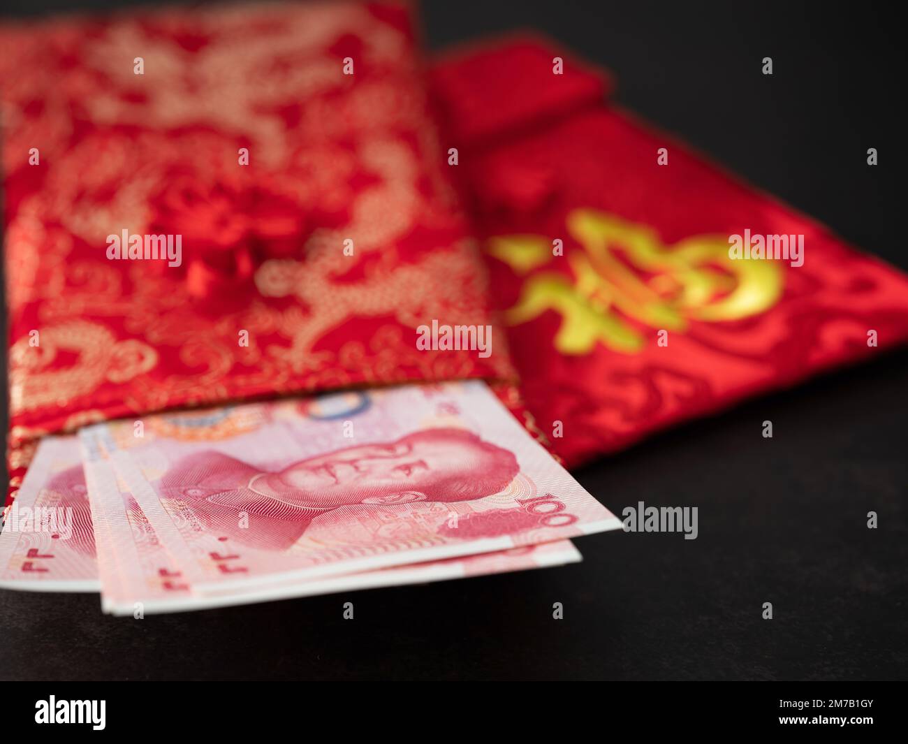 chinese money in chinese new year envelope Stock Photo - Alamy