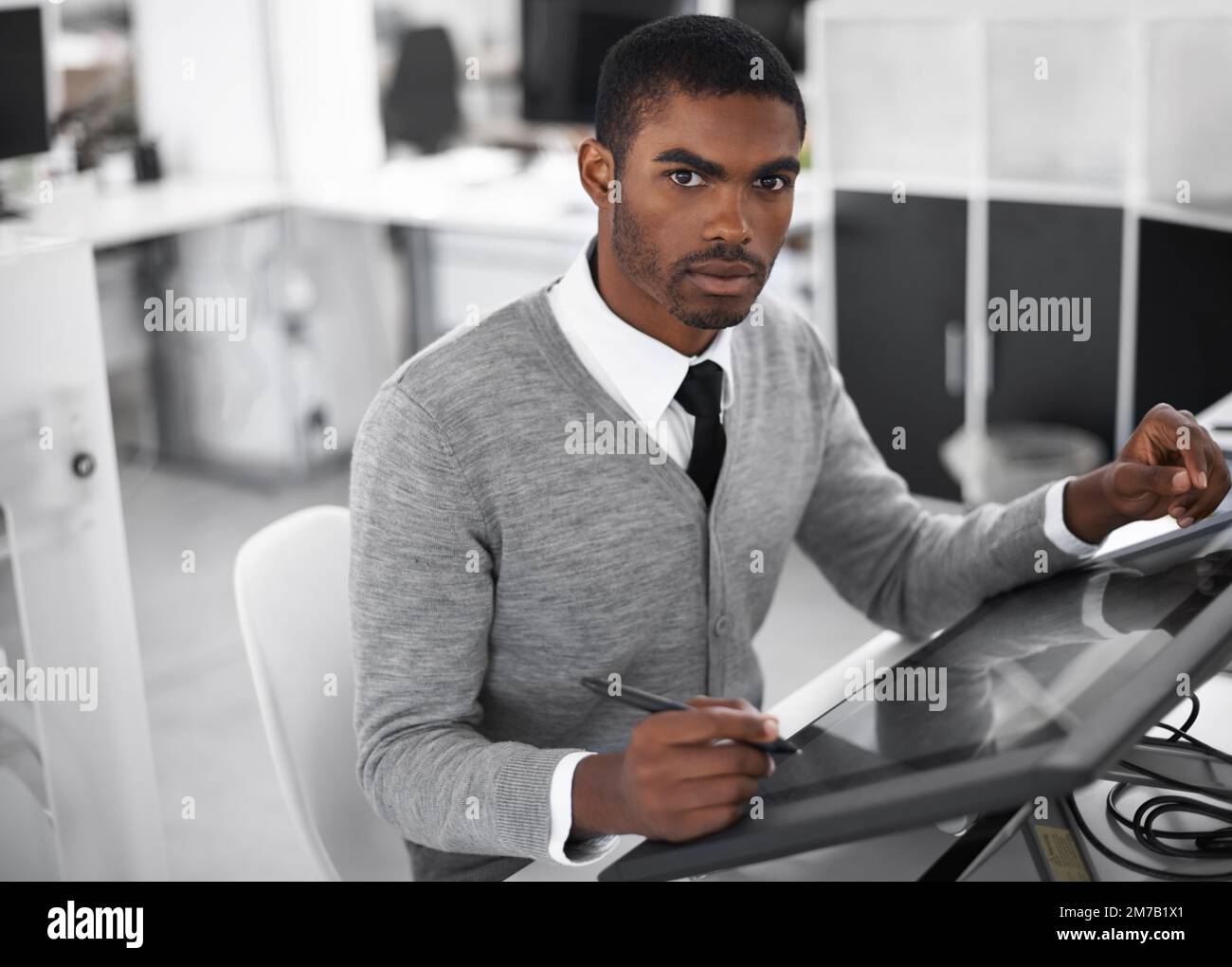 Smart technology makes everything easier. A young man working on a ...