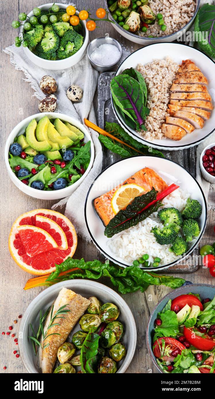 Table of various healthy food dishes. Healthy food assortment. Dieting ...