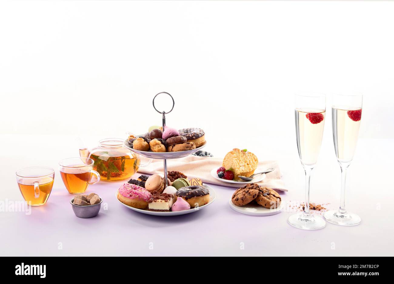 Traditional English tea. Afternoon tea with selection of sweets on ...