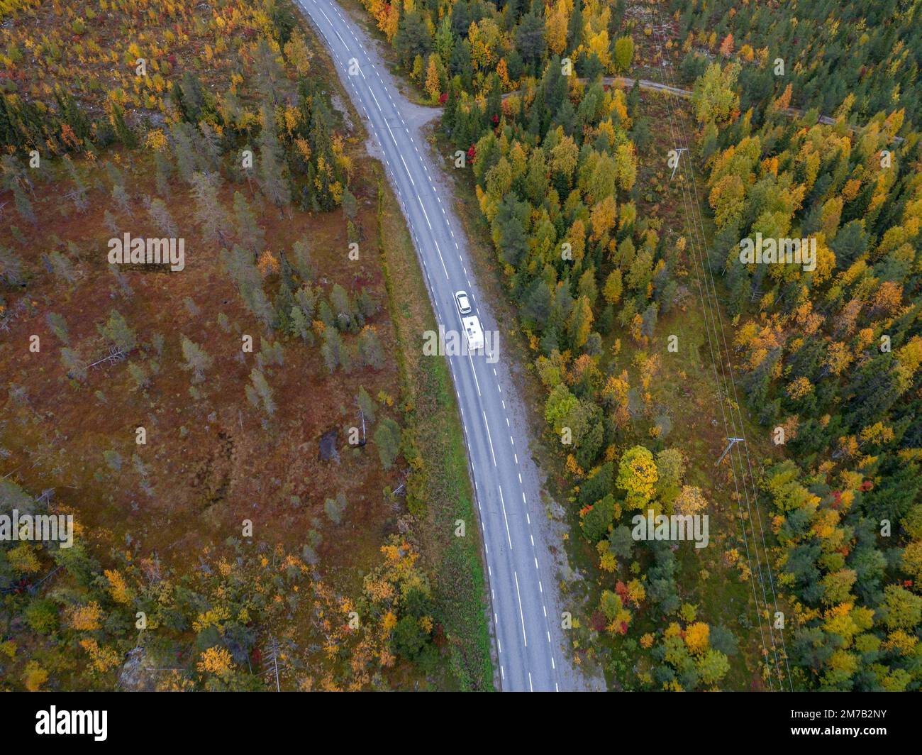 drone footgage Car Camping Caravan driving road lake Swedish Lapland ...