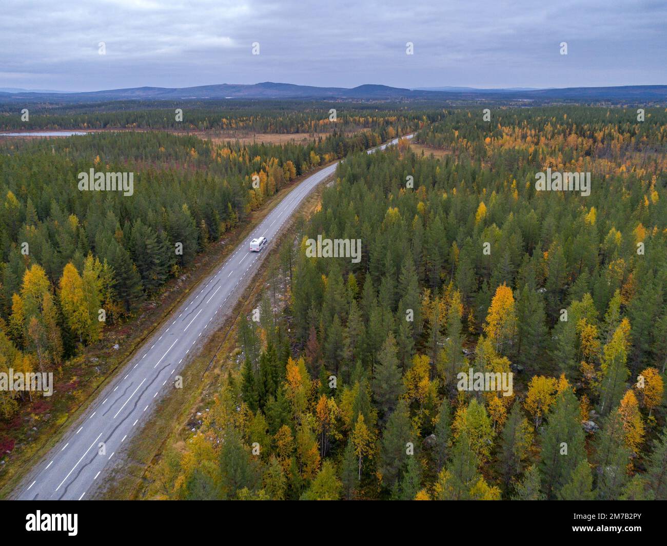 drone footgage Car Camping Caravan driving road lake Swedish Lapland ...