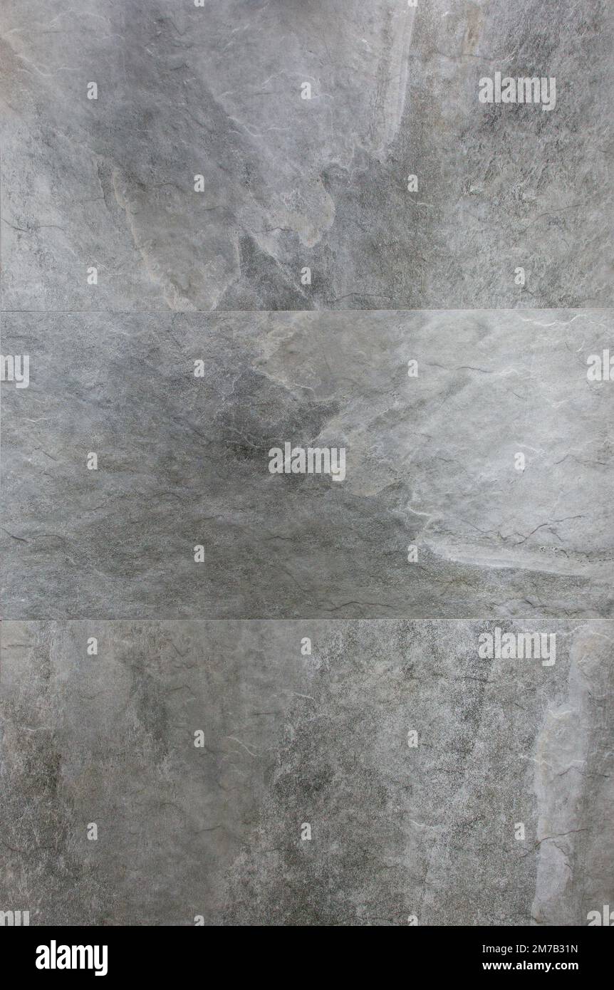 A vertical background divided into three parts in grey colors for ...