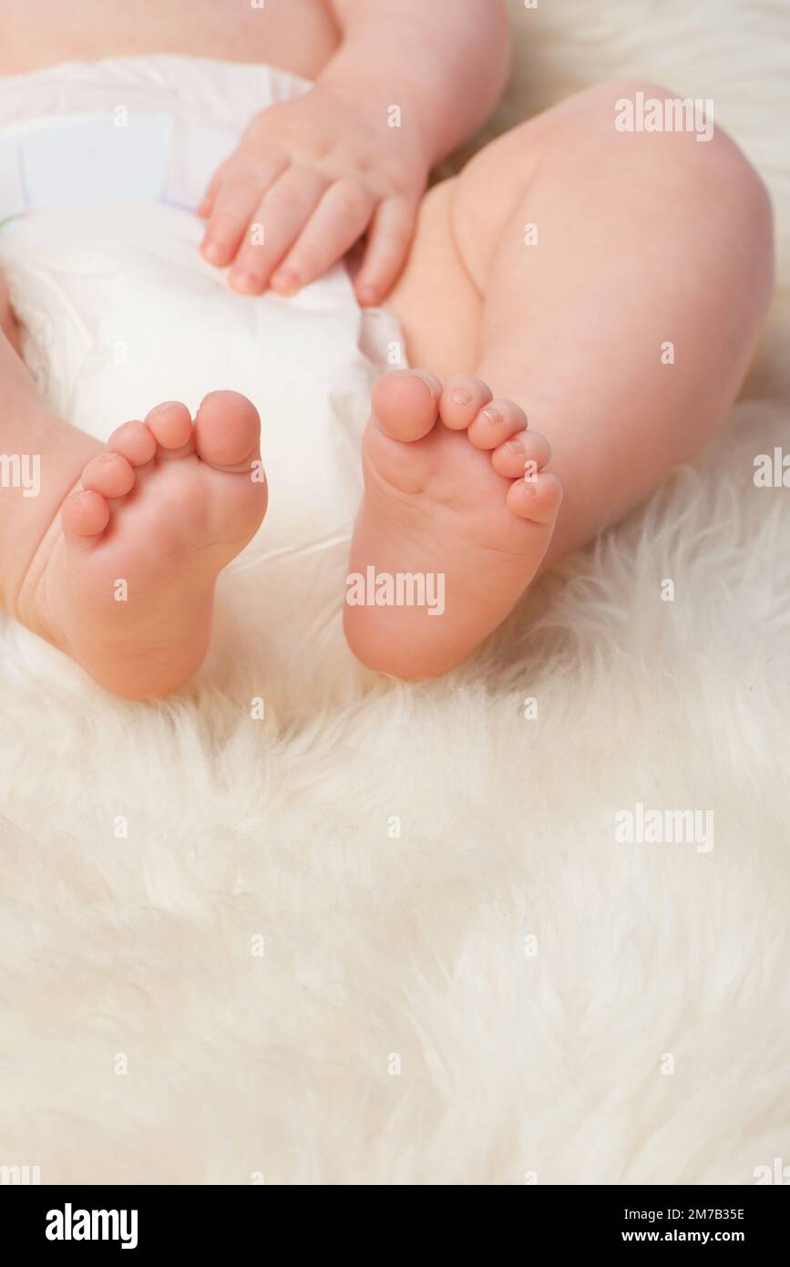 Hes got many steps to walk in life. a baby boys legs and feet in a ... Hes got many steps to walk in life. a baby boys legs and feet in a ...