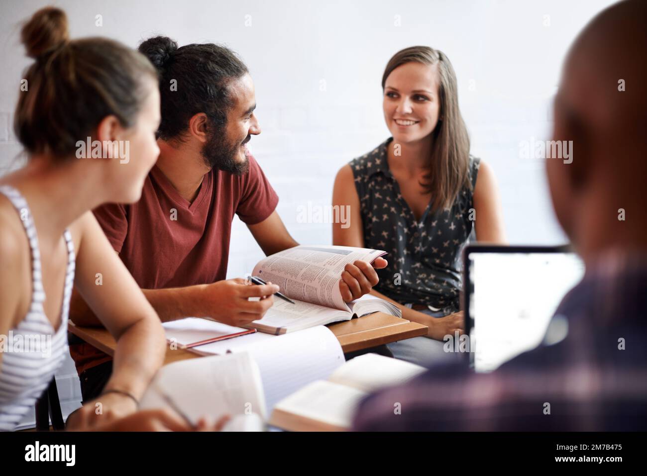 Putting there assignment in focus. a group of university students ...