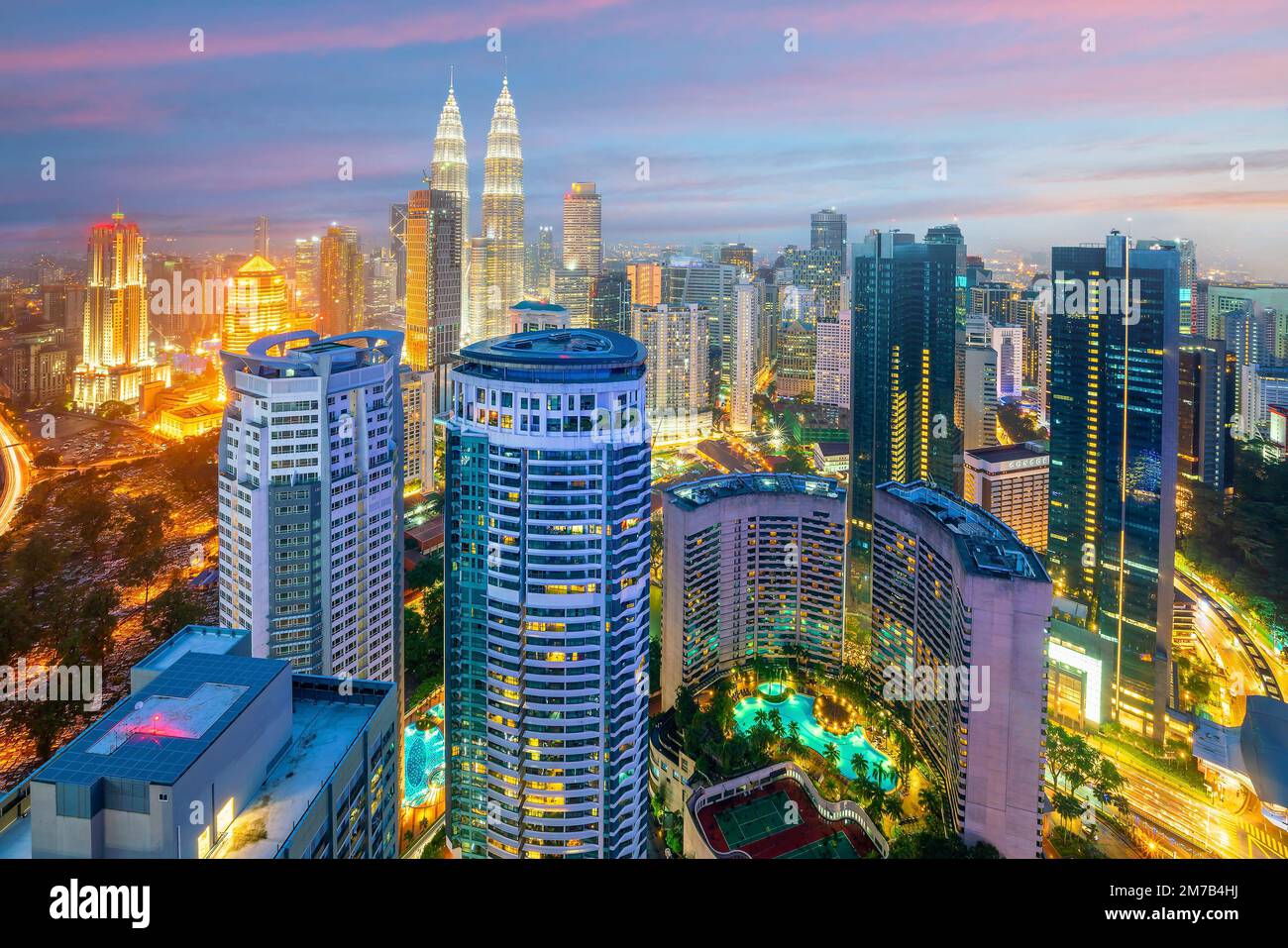 Downtown Kuala Lumpur city skyline cityscape of Malaysia at sunset ...