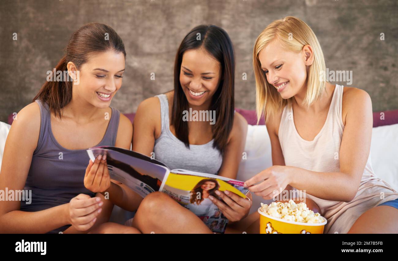 Just letting our hair down. a group of friends browsing through ...