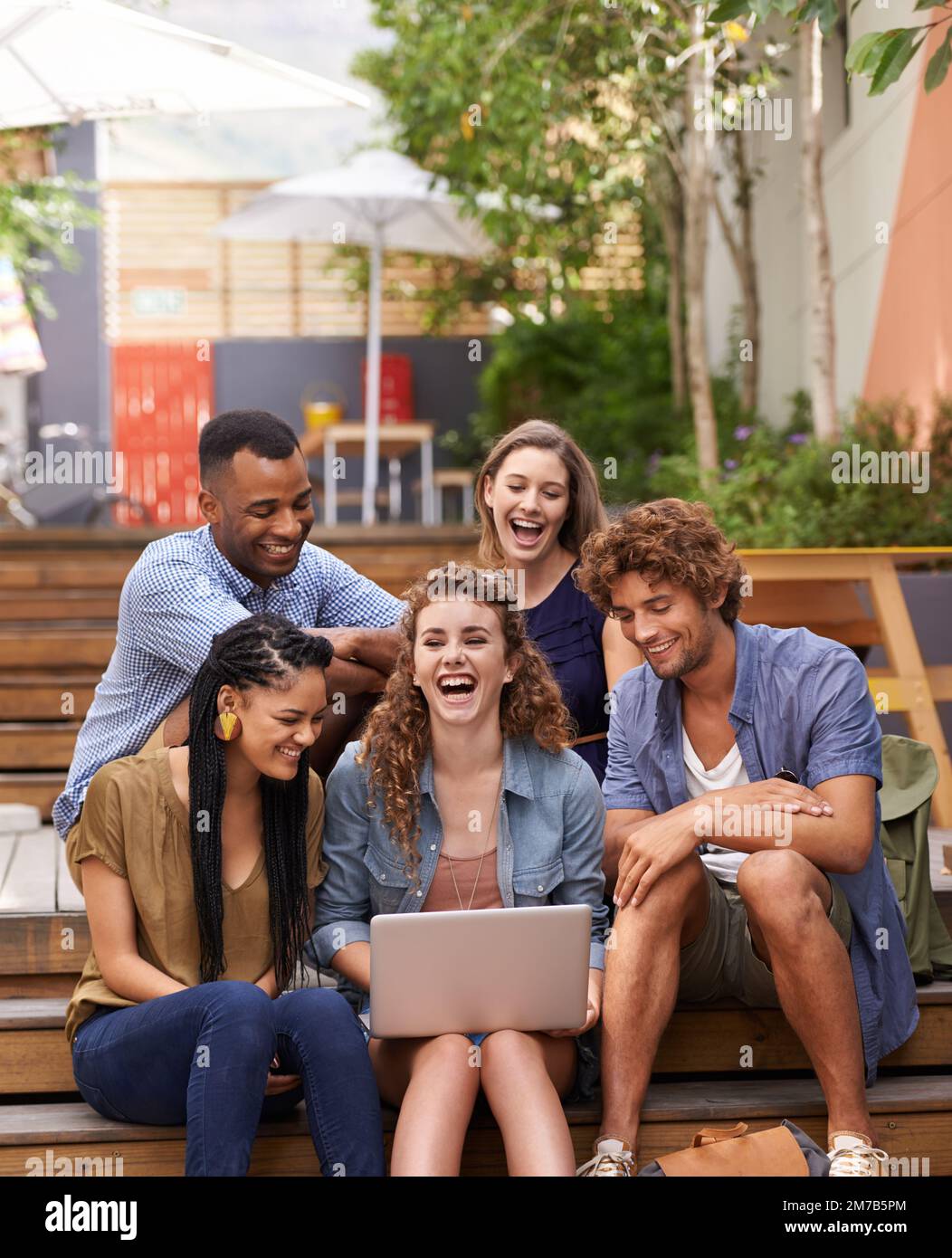 Streaming videos for our entertainment. A shot of university students ...