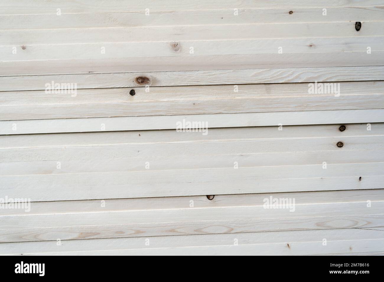 Stacked timber. Timbers ready for sale on the timber site. Withstanding ...