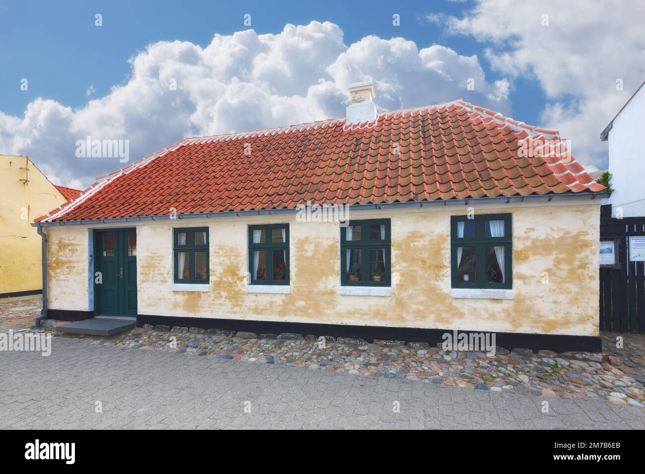 a photo of Old Danish houses - Jutland, Loekken Stock Photo - Alamy